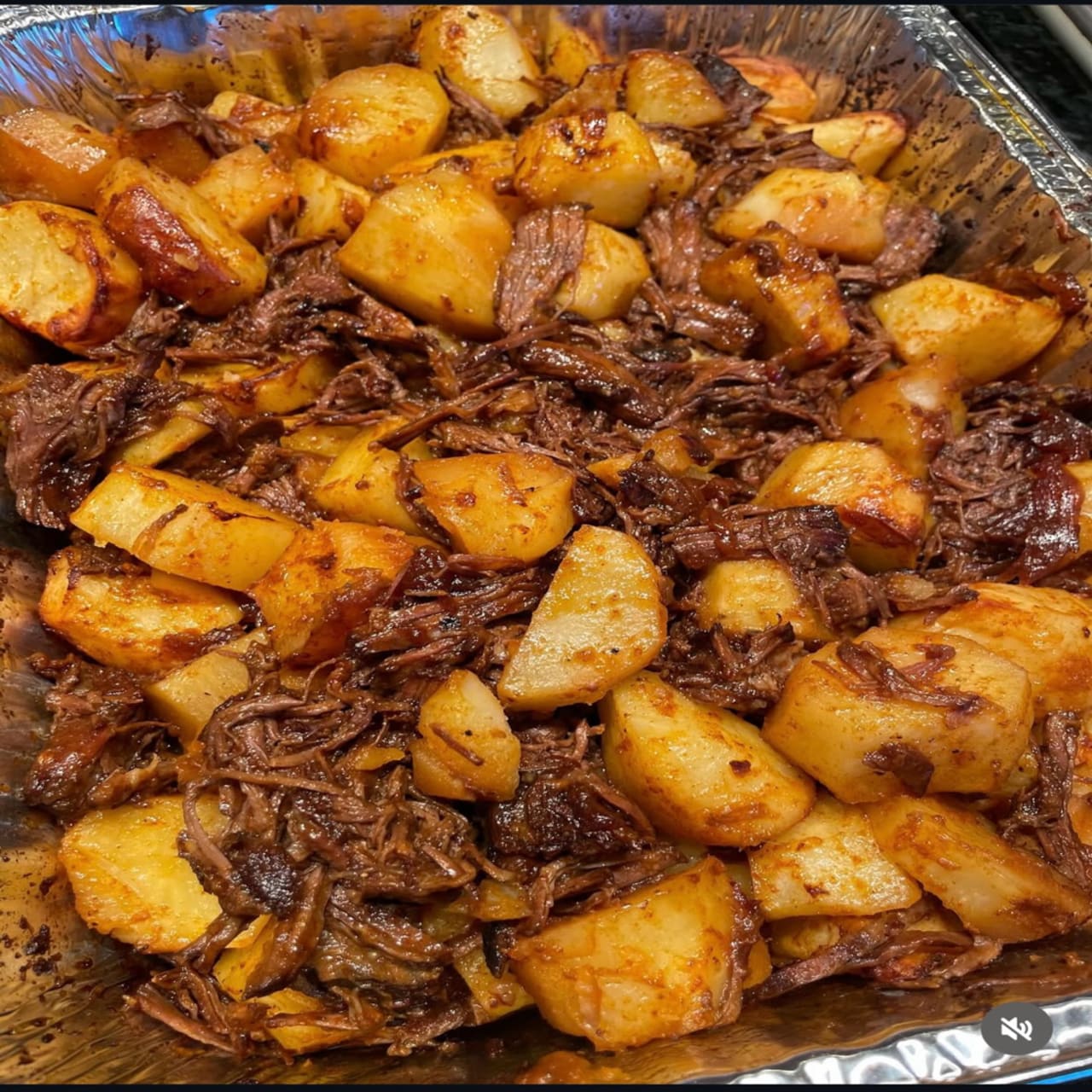 Pulled beef over roasted potatoes