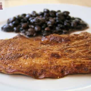 Grilled adobo-marinated beef (Carne asada y adobada)