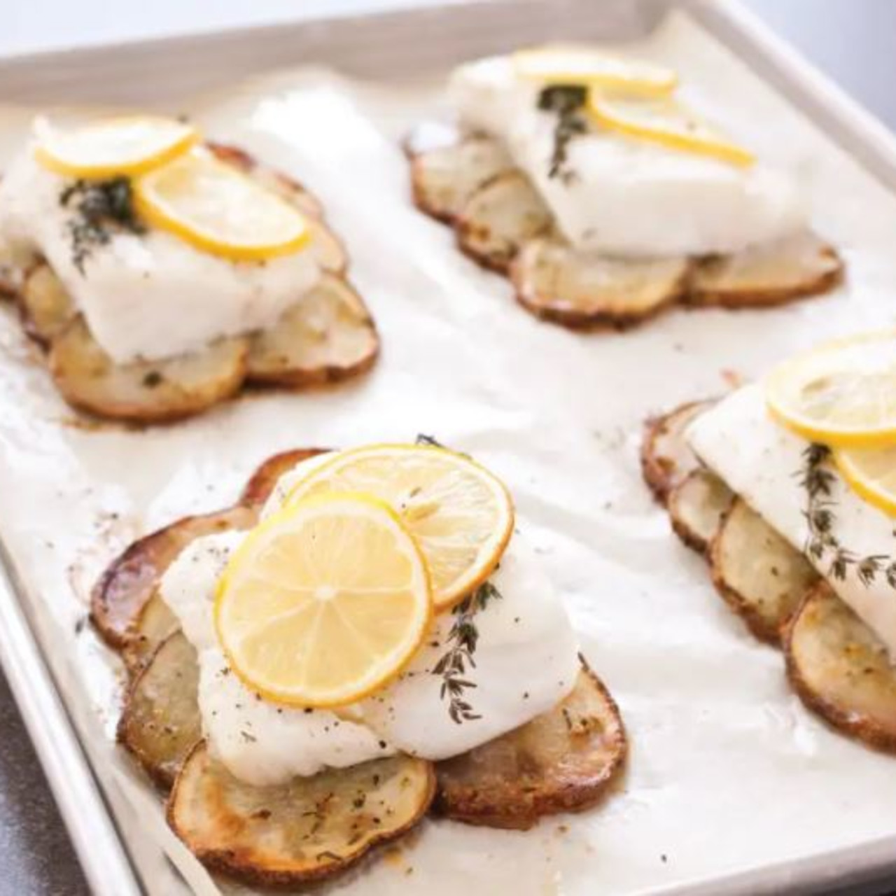 Lemon-Herb Cod Fillets with Crispy Garlic Potatoes