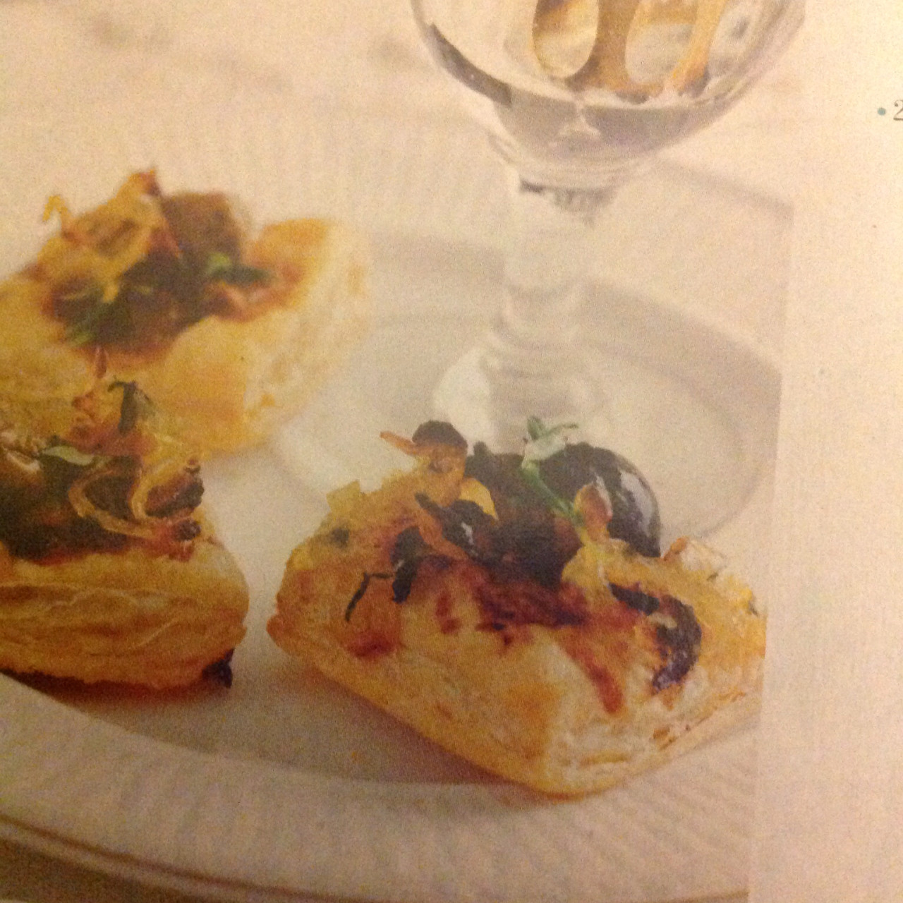 Mini caramelised onion tarts